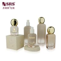China Elegant Rectangle Glass Cosmetic Bottle Gradient Finish Empty Serum Bottle for Facial Skincare Packaging for sale