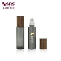 China BLPM 15ML Paint Translucent Color Glass Roll On Bottle With Wooden Cap for sale