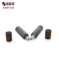 China BLPM 15ML Paint Translucent Color Glass Roll On Bottle With Wooden Cap for sale