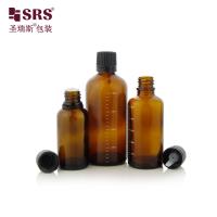 China UV Protection Amber Green Glass Essential Oil Bottle Tamper Evident Screw Cap Custom Logo Cosmetic Packing for sale