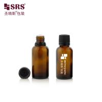 China UV Protection Amber Green Glass Essential Oil Bottle Tamper Evident Screw Cap Custom Logo Cosmetic Packing for sale