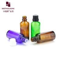 China High Quality Colored Glass Essential Oil Bottle With Tamper Evident Cap Cosmetic Aromatherapy Packaging for sale