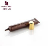 China Dia 19mm Cosmetic Soft Tube Brown Tube with Gold Electroplated Cap for Skincare for sale