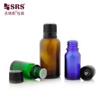 China SRS Custom Logo Empty Round Glass Essential Oil Bottle Tamper Evident Cap Multiple Orifice Sizes for sale