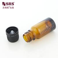 China SRS Custom Logo Empty Round Glass Essential Oil Bottle Tamper Evident Cap Multiple Orifice Sizes for sale