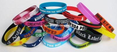 China Custom Silicone Wristband 202x12x2mm Embossed Debossed Promotional Bracelet for sale