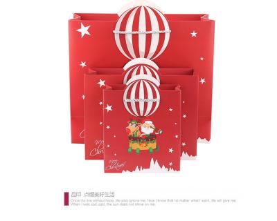 China Custom Recyclable Paper Gift Bags 500pcs MOQ with CMYK Printing Eco Friendly Promotional Bags for sale