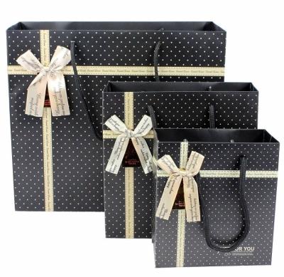 China Custom Logo White Kraft Paper Gift Bags with Handle 3 Sizes S M L Recyclable for sale