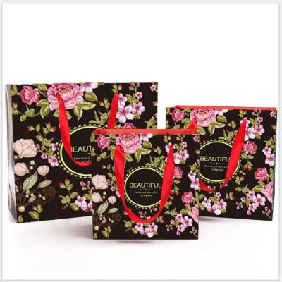 China Custom Recyclable Kraft Paper Gift Bags with Handle 3 Sizes S M L for sale
