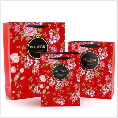 China Wholesale Recyclable Kraft Paper Gift Bags with Custom Logo in 3 Sizes S M L for sale