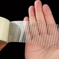 China Fabric Glue Reinforcement Cross Filament Tape With High Temperature Hot Melt Adhesive for sale