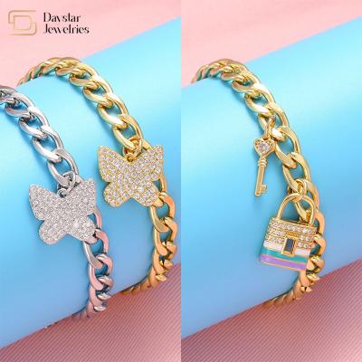 China Gold Plated Stainless Steel Butterfly Charm Bracelet with Key Lock Pendant 8mm Cuban Link for sale