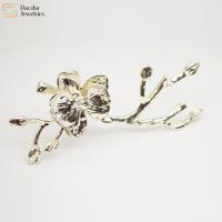 China Metal Plum Blossom Flower Napkin Rings For Dining Table Decor for sale