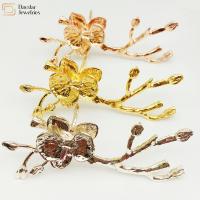 China Metal Plum Blossom Flower Napkin Rings For Dining Table Decor for sale