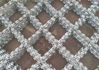 China Welded Concertina Coil Fencing Galvanized Flat Wrap Razor Wire Fencing 100X150mm for sale