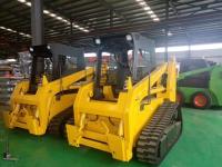 China 4x4 Wheel Drive Tracked Skid Steer Loader with Big Power Disc Type Trencher Rock Saw for sale
