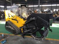 China 4x4 Wheel Drive Tracked Skid Steer Loader with Big Power Disc Type Trencher Rock Saw for sale