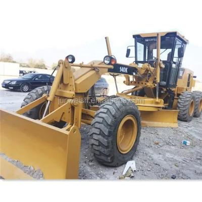 China 18000 kg Detuz Engine Used Caterpillar Motor Grader CAT 140K 140H with Front Blade Bucket for sale