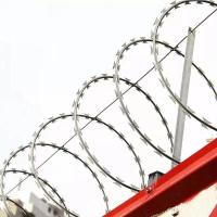 China Galvanized Protecting Mesh Stainless Steel Triple Concertina Razor Barbed Wire Fence for sale