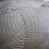 China Galvanized Stainless Steel Single Loop Cross Concertina Flat Blade Barbed Wire Roll - Razor Barbed Wire Fence for Out for sale