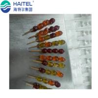 China SUS Food Grade Candy Stick Insert Machine Output 50-60 String Per Min for sale