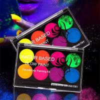 China 8 Color Neon Christmas UV Glow Face Paint Palette Luminous Body Paint Water Based Black Light Make-Up for sale