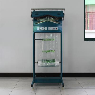 China Industrial Dry Cleaning Shop Garment Suit Packing Machine Clothes Packaging and Sealing Machine for sale