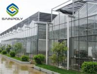 China 275g/m2 Side Ventilation Glass Hydroponic Greenhouse For Flowers for sale