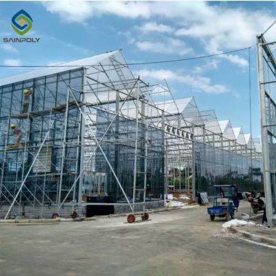 China Transparent Multi Span 120km/H Commercial Glass Greenhouse for sale