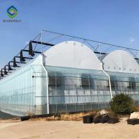 China Sawtooth Top Ventilation Agricultural Glass Greenhouse 9.6m Multi Span for sale