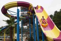 China Customized Water Park Equipment Exciting Swwiming Pool Fiberglass Waterslides For Adults for sale