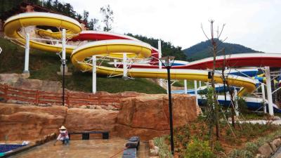 China Stainless Steel Fastener FRP Spiral Water Slides For Giant Outdoor Water Park for sale