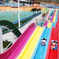 China OEM Big Rainbow Water Slides Four / Six Lanes For Water Park for sale