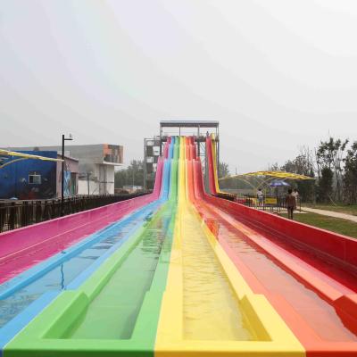 China Multi Lanes Rainbow FRP Custom Water Slides Amusement Park Big Water Slide for sale