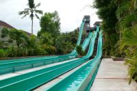 China High Speed Water Slide with Hot-Dip Galvanized Steel Structure and Hand-Laid Fiberglass Flume Featuring Corrosion-Resistant Water Pump for sale