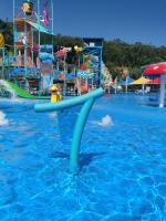 China Children's Water Play Equipment with Hot-Dip Galvanized Steel Structure, Corrosion-Resistant Fiberglass Flume, and Shallow Water Safety Design for sale