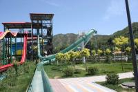 China Loop Water Slide with 16m Platform Height, 120-Person Capacity, and Hot-Dip Galvanized Steel Structure for sale