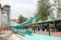 China Loop Water Slide with 16m Platform Height, 120-Person Capacity, and Hot-Dip Galvanized Steel Structure for sale
