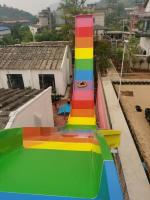 China U-Shaped Water Slide with 90° Vertical Drop Wall, 12m Platform Height, and 2-Person Raft for Thrill Seekers for sale