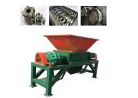 China Twin Shaft Waste Tire Shredder Machine With High Strength Moving Blade for sale