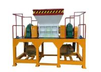 China Twin Shaft Waste Tire Shredder Machine With High Strength Moving Blade for sale