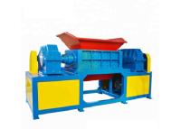 China Twin Shaft Waste Tire Shredder Machine With High Strength Moving Blade for sale