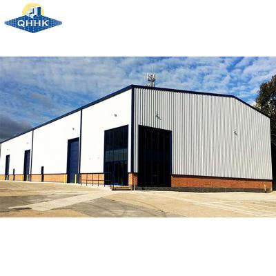 China Red Iron I-Beam Frames Prefabricated Warehouse Buildings In Steel for sale