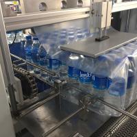 China Automatic High Speed Linear Type PE Film Shrink Stretch Wrapping Packing Machine For Bottled Water Drink for sale