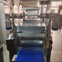 China Automatic Vacuum Packing Line Braised Egg Vacuum Packaging Machine for sale