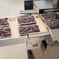 China Automatic Date Production Line Date Stretch Film Vacuum Packaging Machine for sale