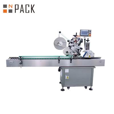 China Npack High Speed PLC Control Horizontal Vial Labeling Machine with 100PCS/Min and Stainless Steel 304/316 Construction for sale