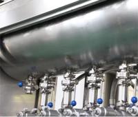 China Npack Automatic Linear Type Volumetric Tomato Paste Filling Sealing Packaging Machine for sale