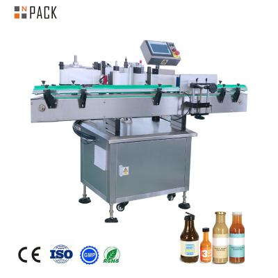 China Npack PLC Control Automatic Round Bottle Labeling Machine for Liquid/Sauce/Oil/Paste/Juice/Wine for sale