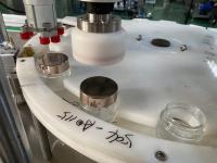 China Npack Automatic Cosmetic Cream Bottle Filling Capping Machine for Glass Jar for sale